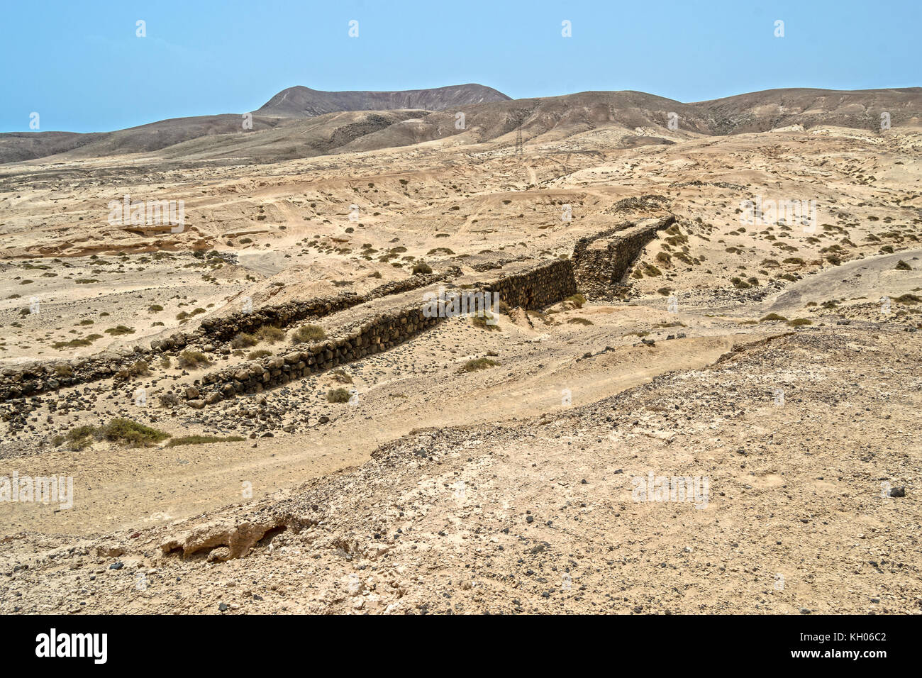 stone walls built in the desert to protect themselves from the wind in ...