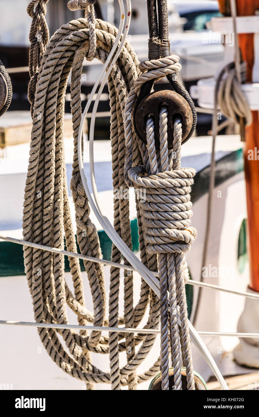 Ropes, rigging and details of equipment on an old sailboat Stock Photo ...