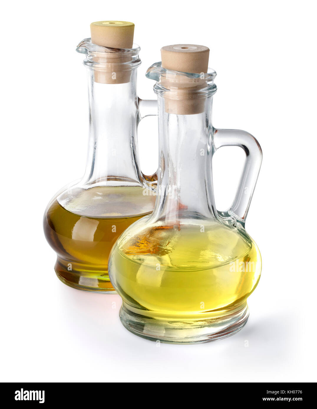olive vegetable oil in glass pitchers isolated on white with clipping ...