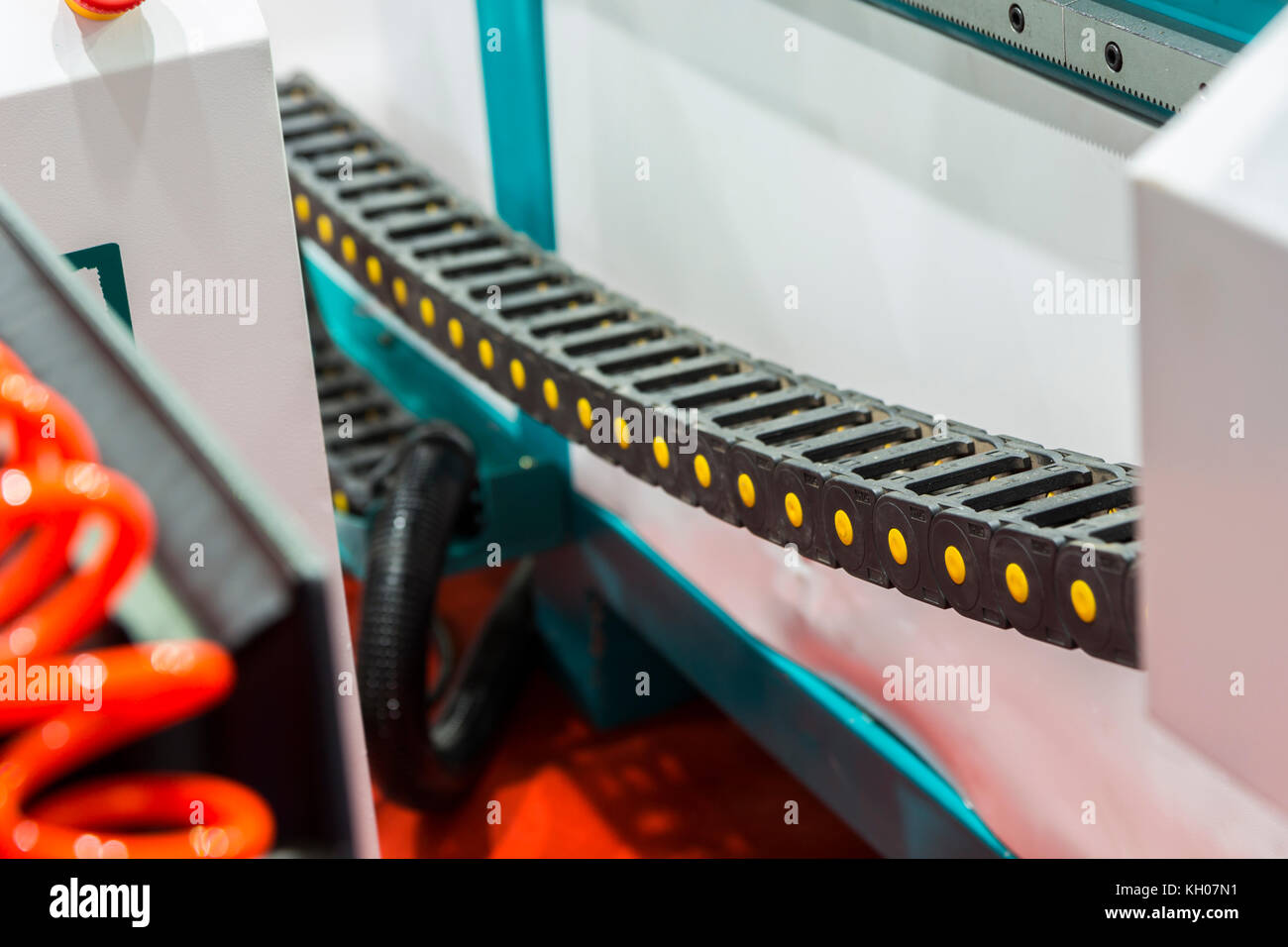 flexible power wire tray moving mechanism detail in an industrial ...