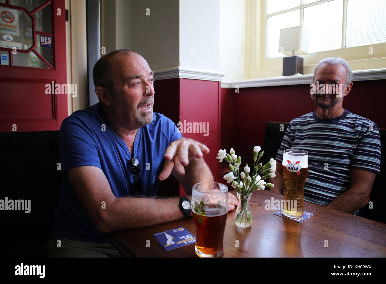 Old men drinking in pub hi-res stock photography and images - Alamy