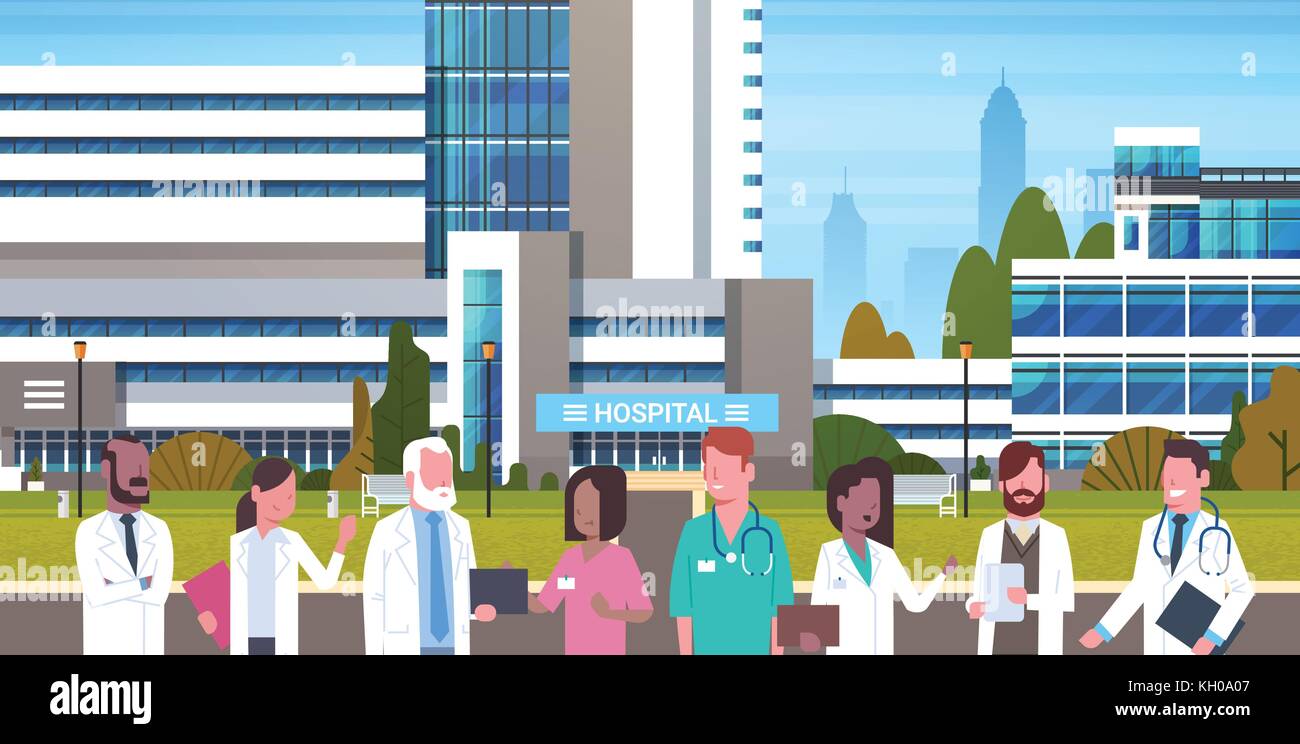 Group Of Medical Doctors Standing In Front Of Hospital Building ...