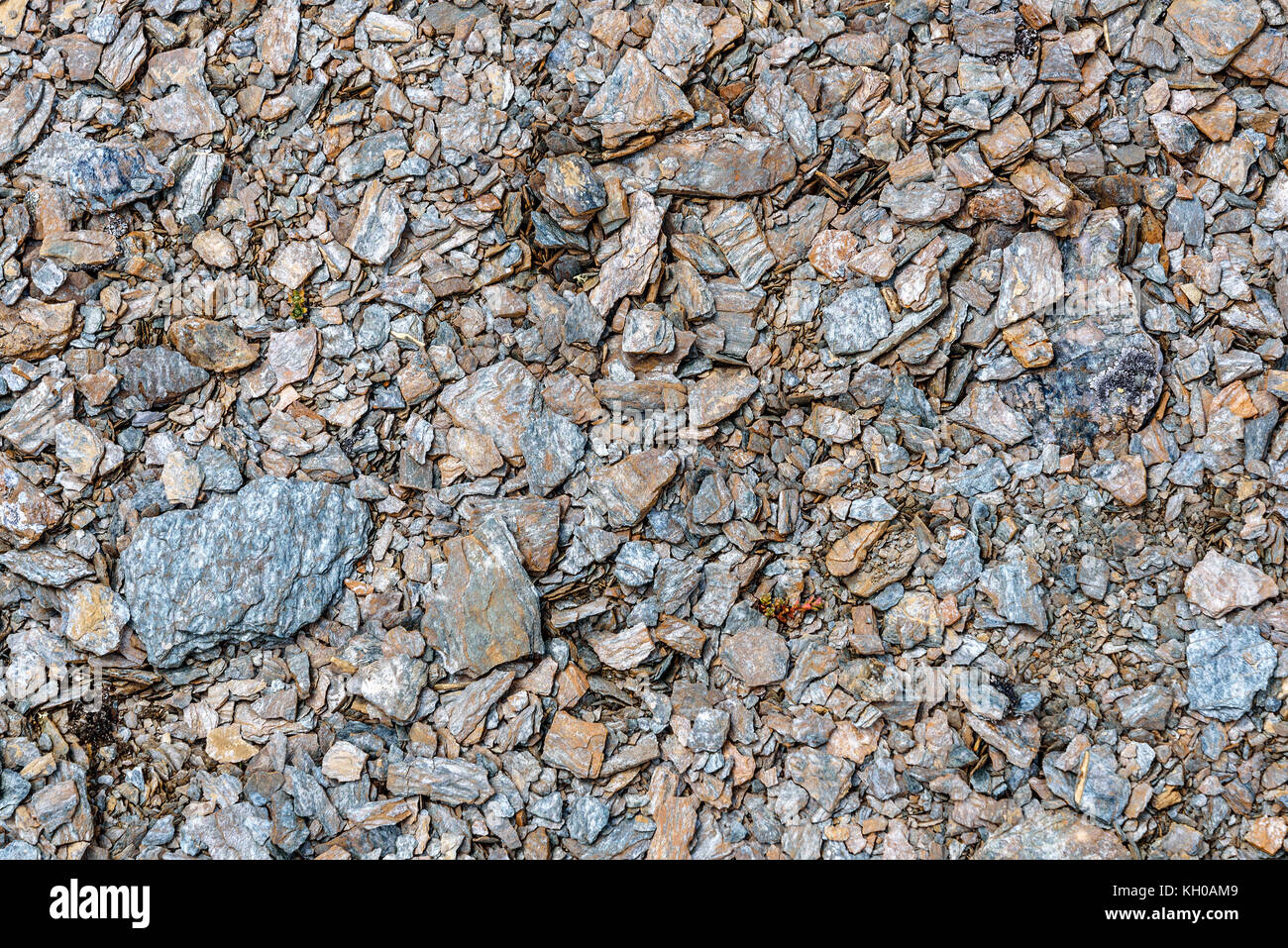 Abstract natural building background with gray small stones in the form ...