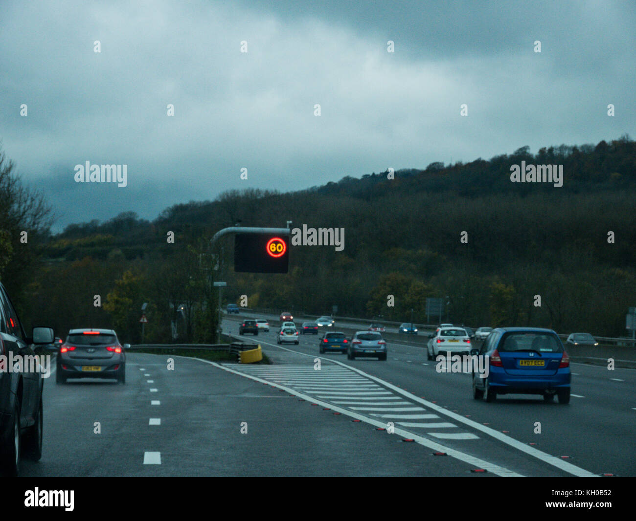 Restricted speed limit on M25 smart motorway Stock Photo - Alamy