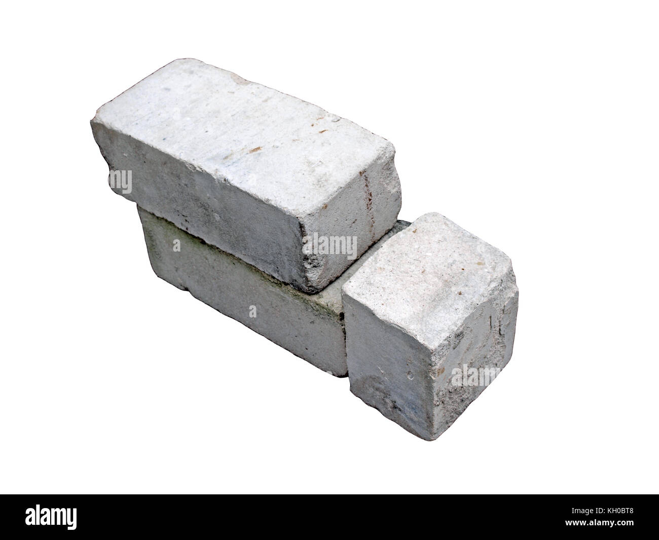 Two and half silicate bricks isolated on white background close up ...