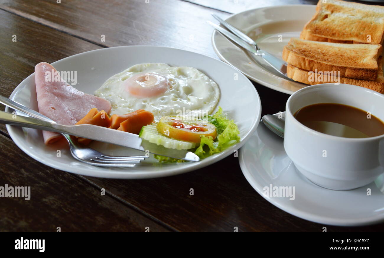 breakfast set and coffee on table Stock Photo - Alamy
