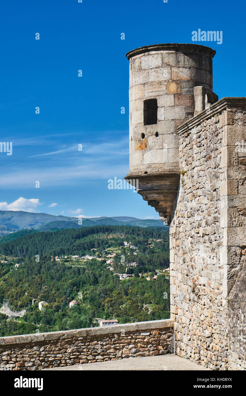 The stone turret and walls of the medieval castle of Aubenas in France ...