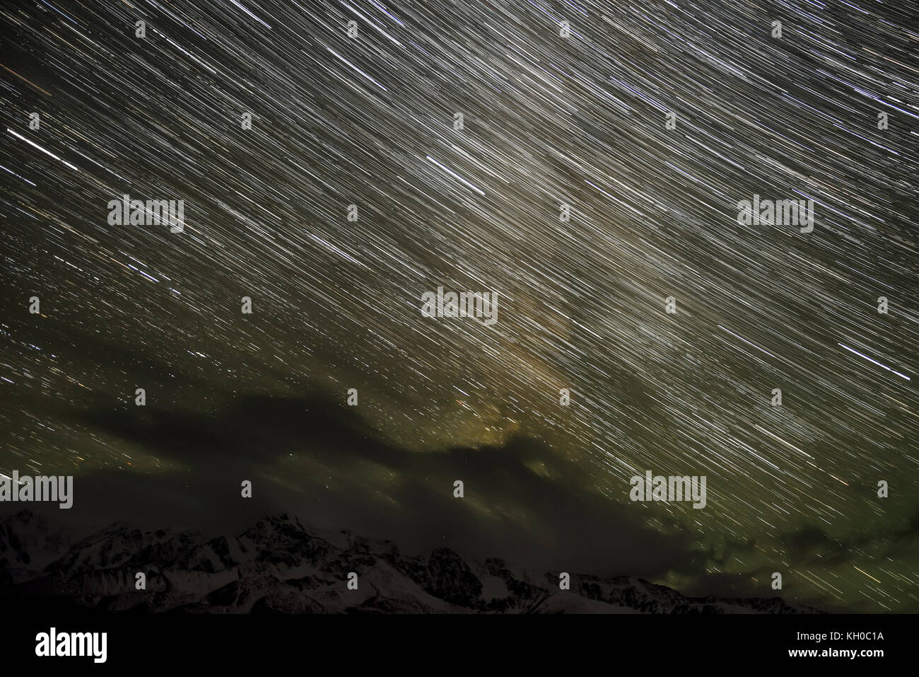 Beautiful night view with traces of stars in the form of tracks and ...