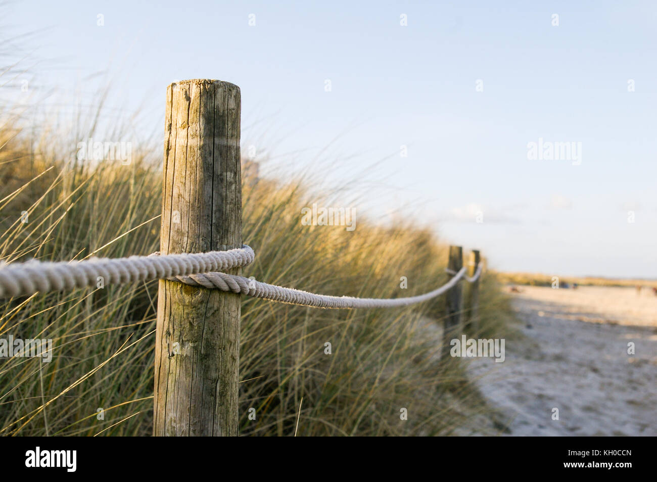 Beach rope fence at Studland Beach on a summer's evening - calm and ...