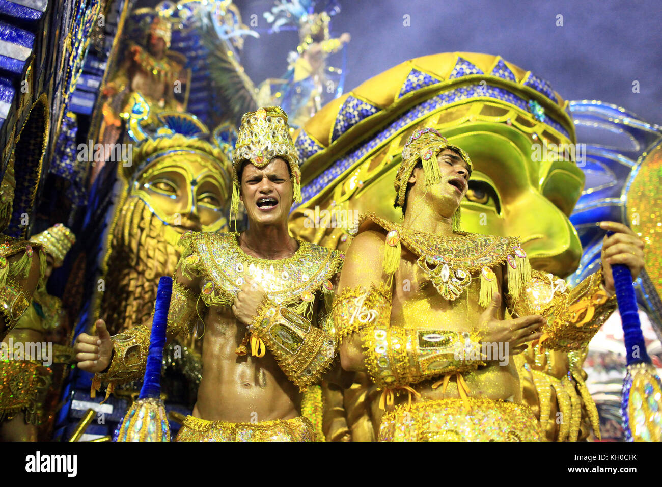 Samba dancers and parade members of the Beija-Flor samba school sings ...
