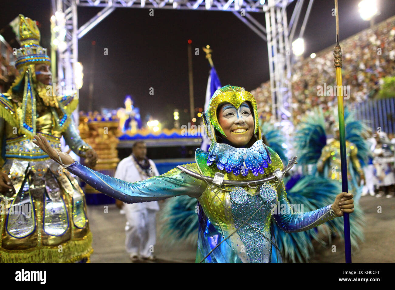 A delighted and smiling dancer from the Beija-Flor samba school wears a ...