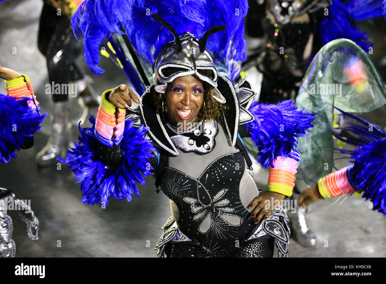 A delighted samba dancer from the Grande Rio samba school wears a ...