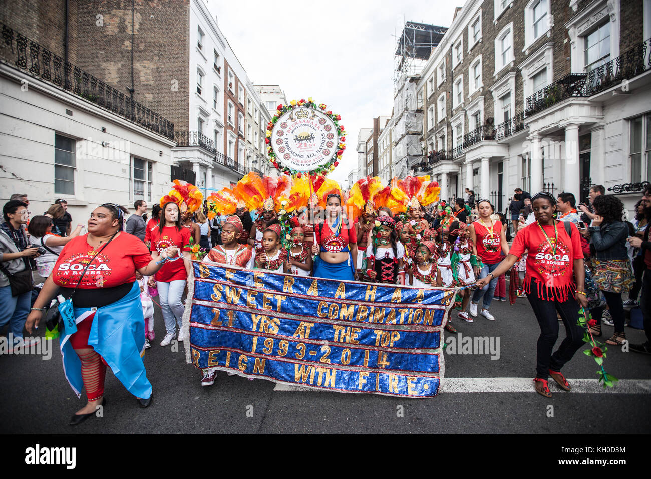 A carnival groups leads the parade through the streets of the Notting ...
