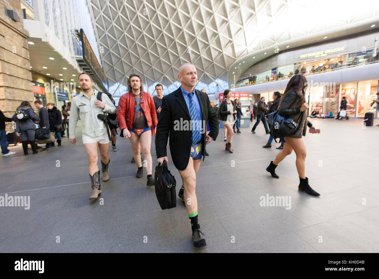 A “No Trousers Day” participant is well dressed wearing a tie, a blazer ...