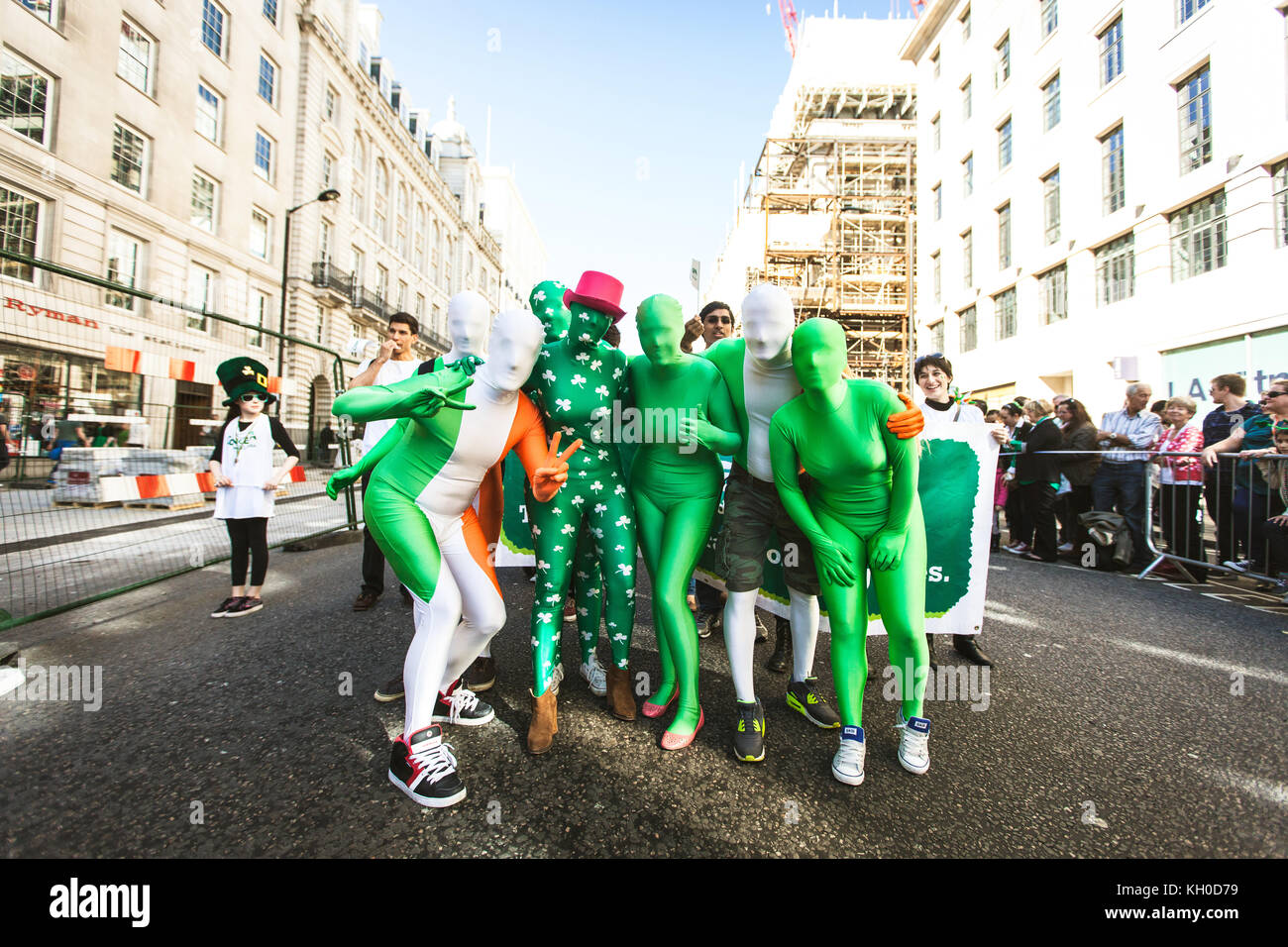 A group of participants wears full body spandex suits that include the ...