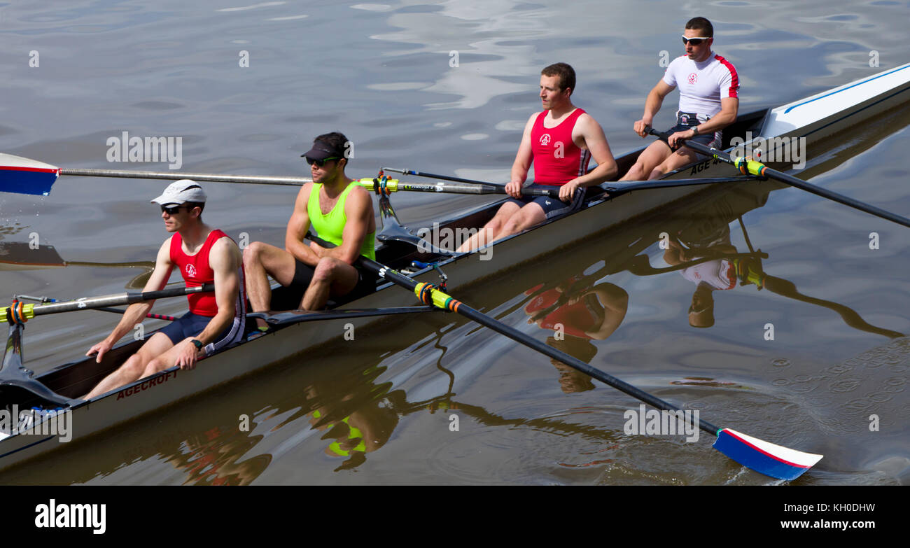 Four man crew resting during training on the Manchester Ship Canal in ...