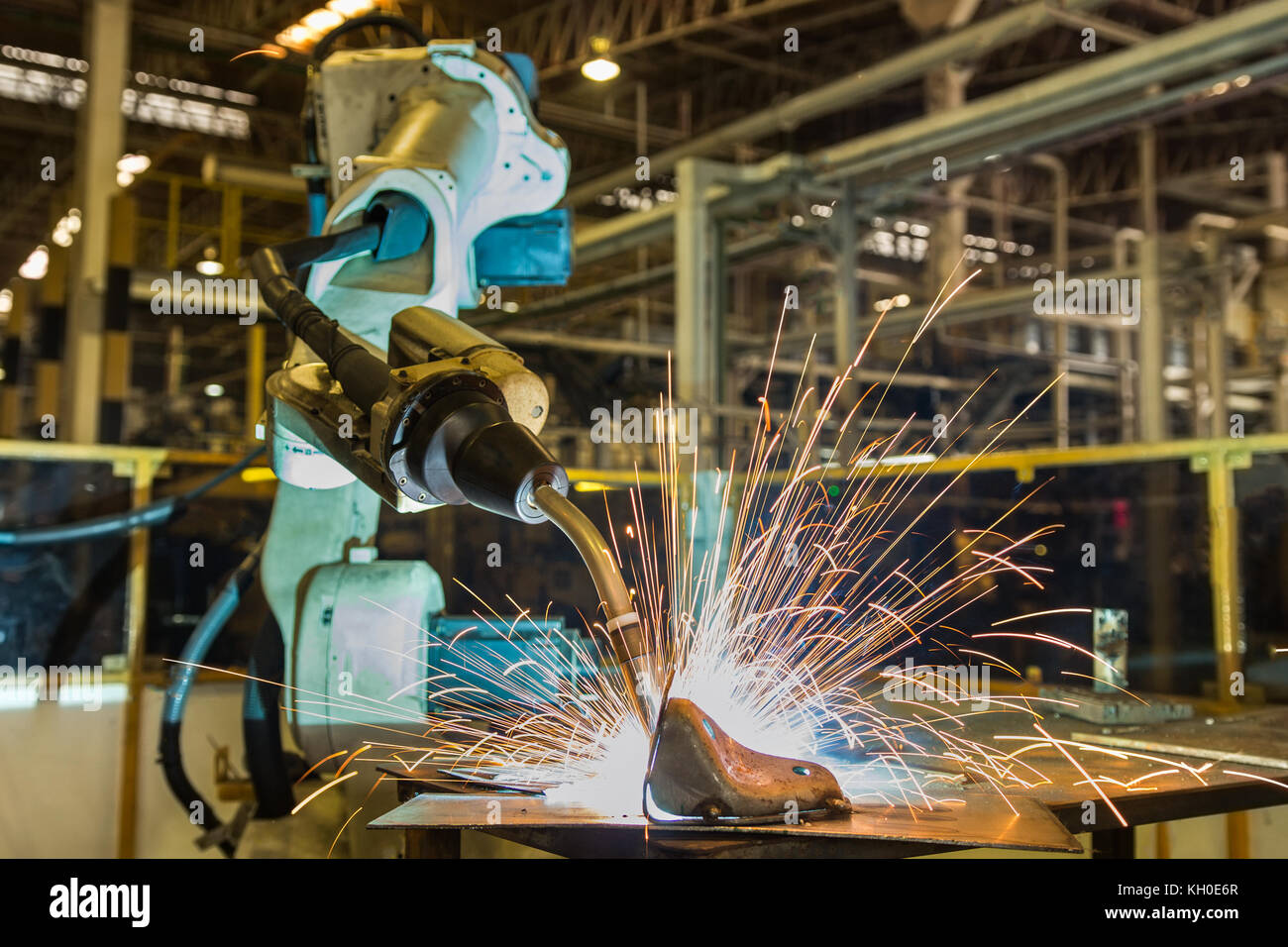 Robot welding is welding automotive part in factory Stock Photo - Alamy