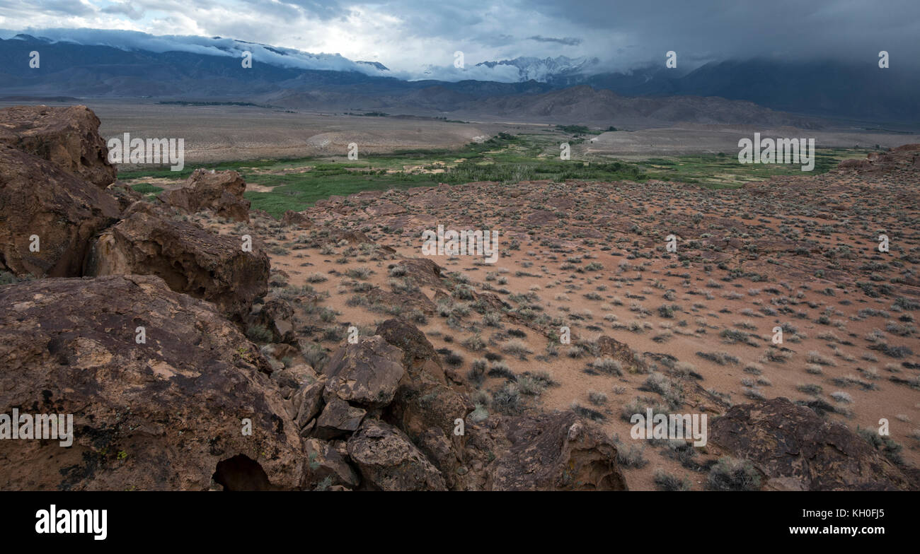 The Sierra Nevada Mountains stand over the dramatic Volcanic Tablelands ...