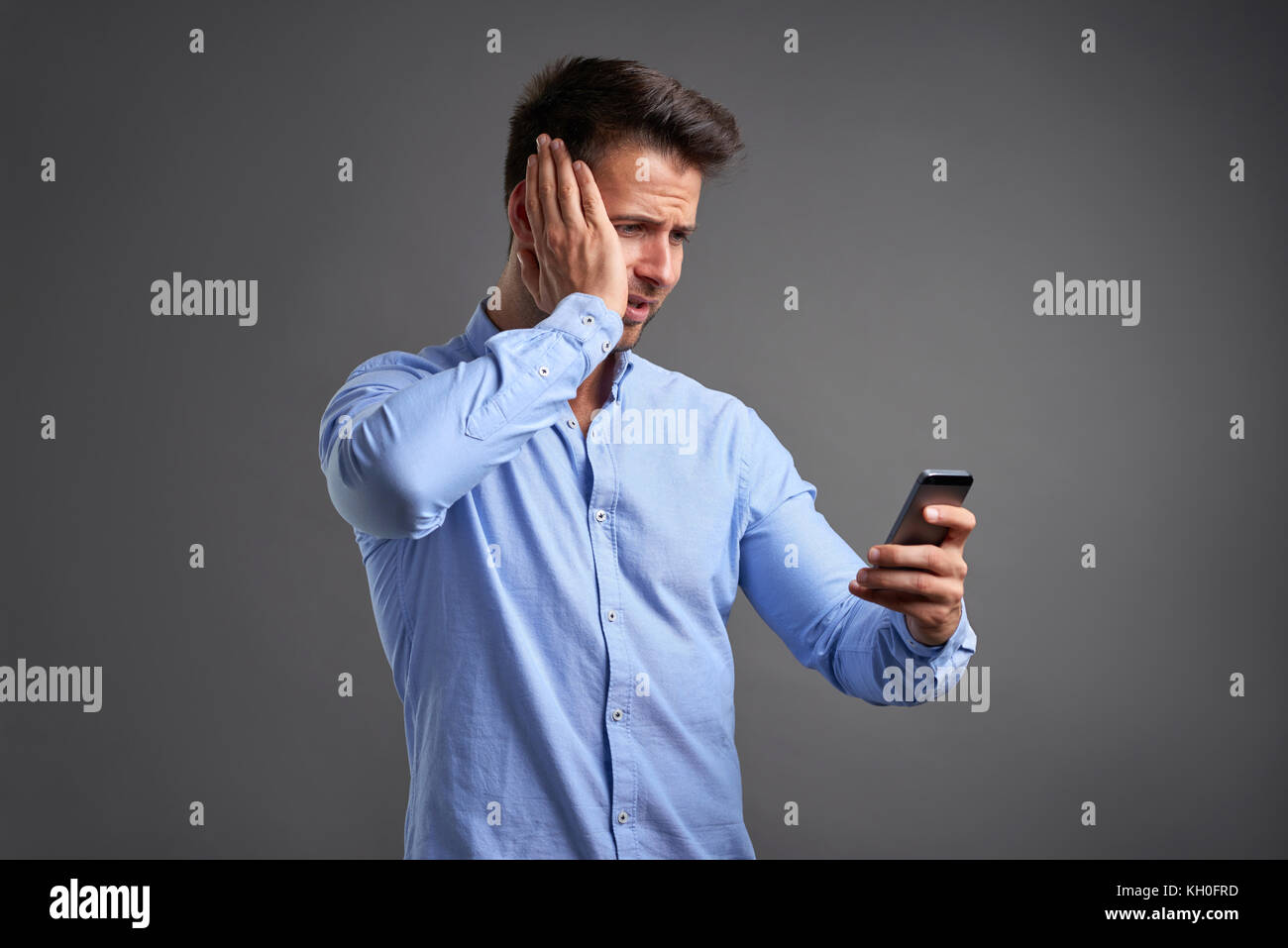 Man grabbing phone hi-res stock photography and images - Alamy