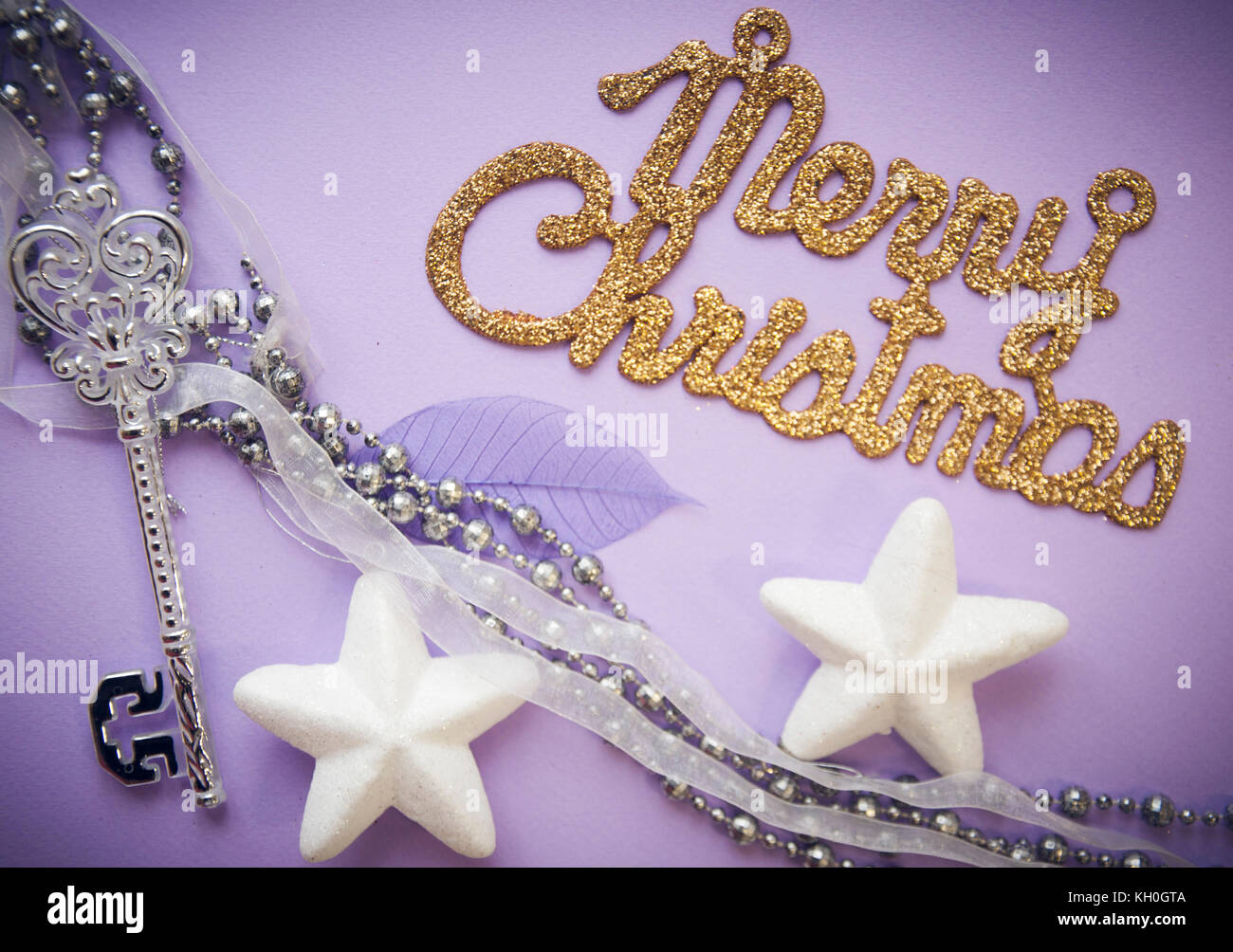 christmas background with holiday ornaments on lilac background Stock ...
