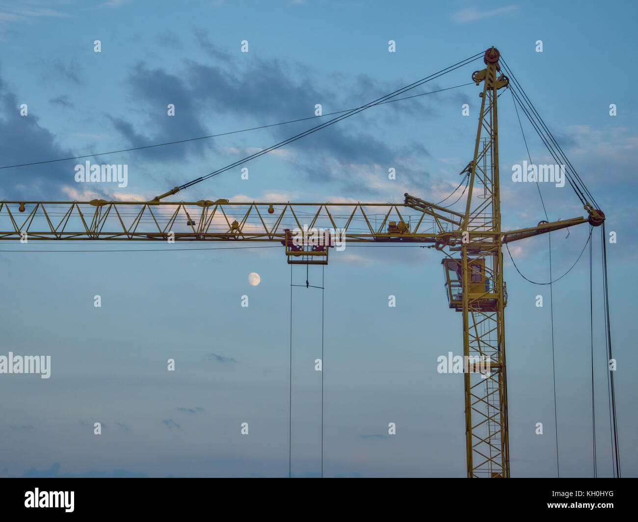 Photograph of construction of high-rise tower crane on a background of ...
