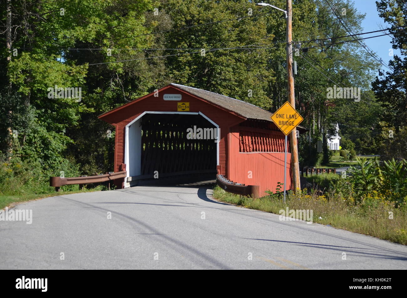A red covered bridge in Vermont Stock Photo - Alamy