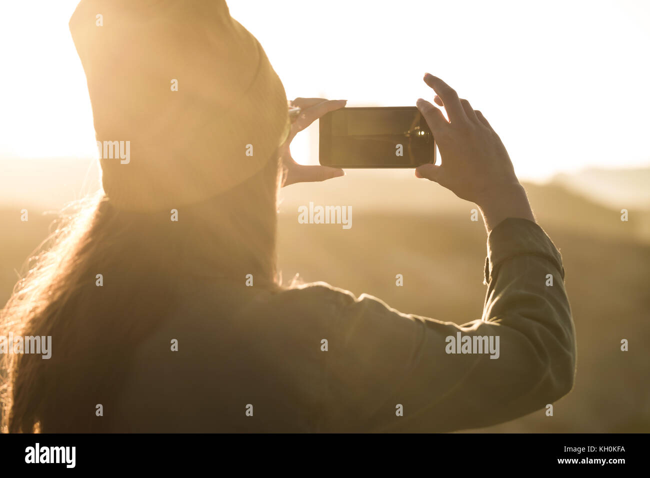 Woman hand taking mobile phone hi-res stock photography and images - Alamy