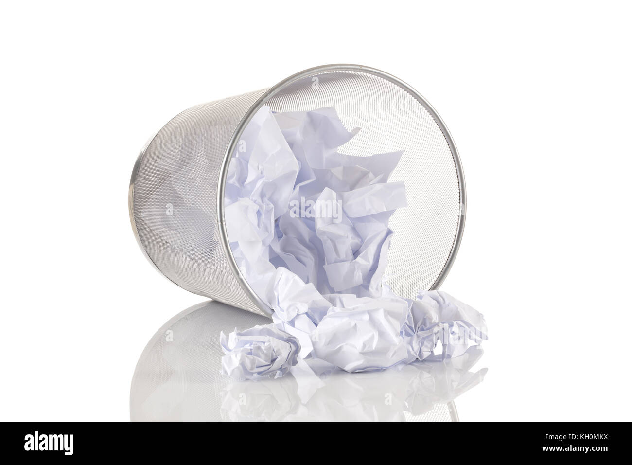 Metal trash can bin with paper isolated on white background Stock Photo ...