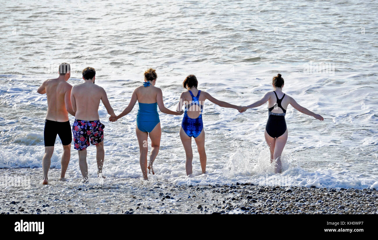 Swimmers holding hands hi-res stock photography and images - Alamy