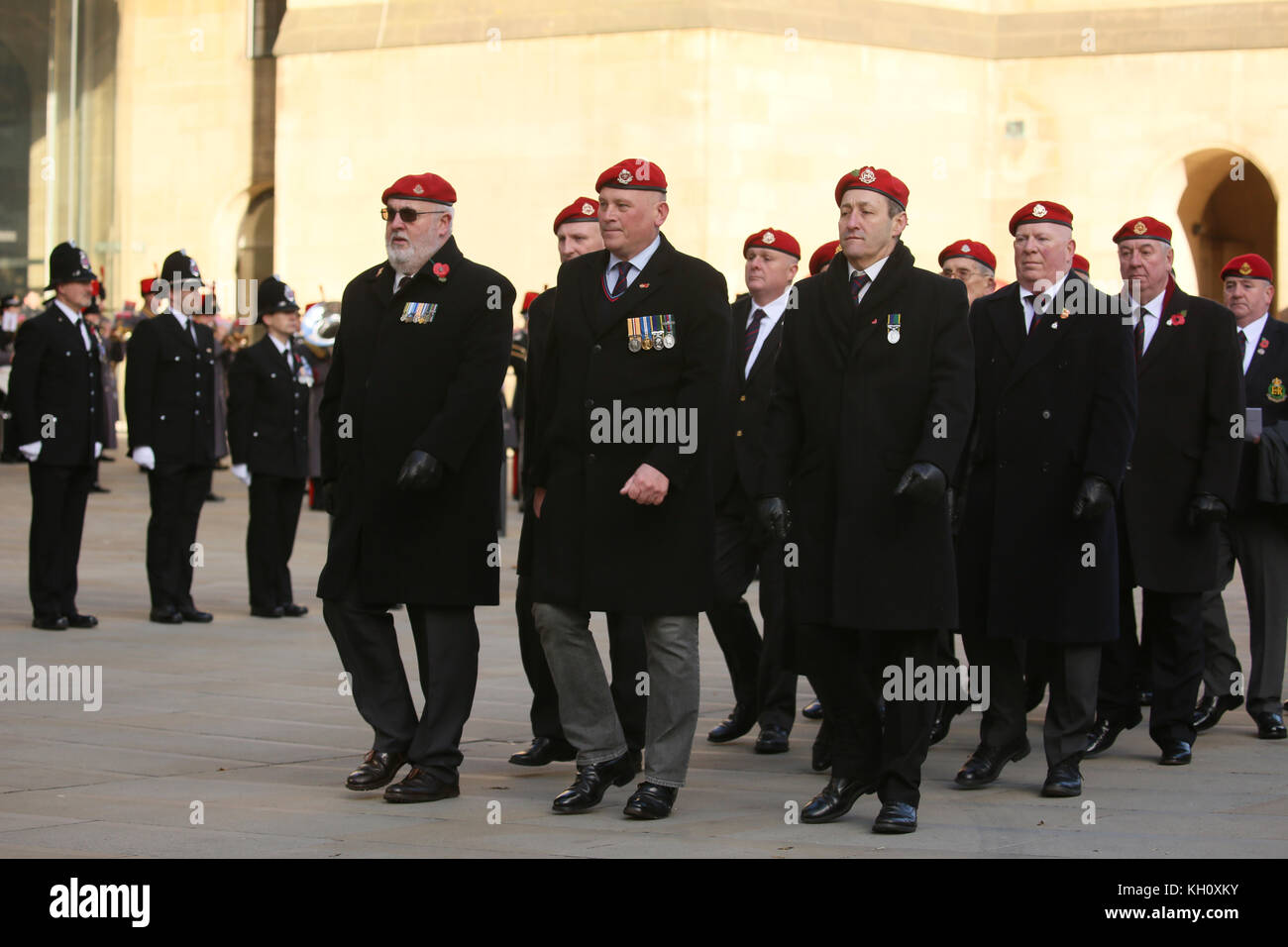 Manchester, UK. 12th Nov, 2017. Men wearing red Military Berets march ...