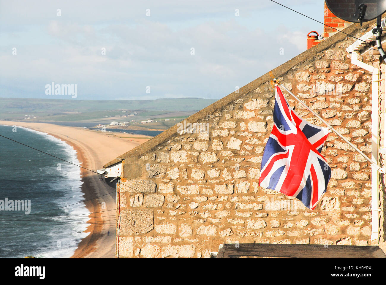Portland, Dorset, UK. 12th November 2017 - A Union Jack flies high ...