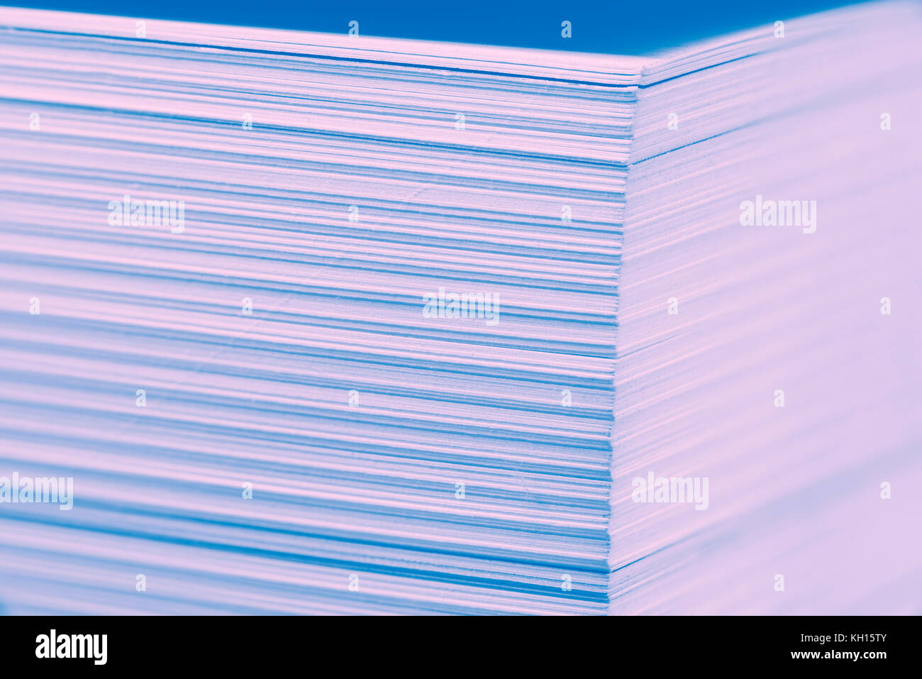 large stack of paper pages with sharp focus on the corner Stock Photo ...