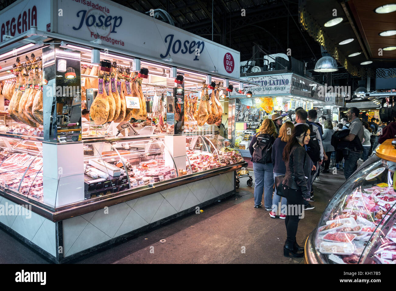 chorizo and jamon serrano stalls at famous la boqueria market in ...
