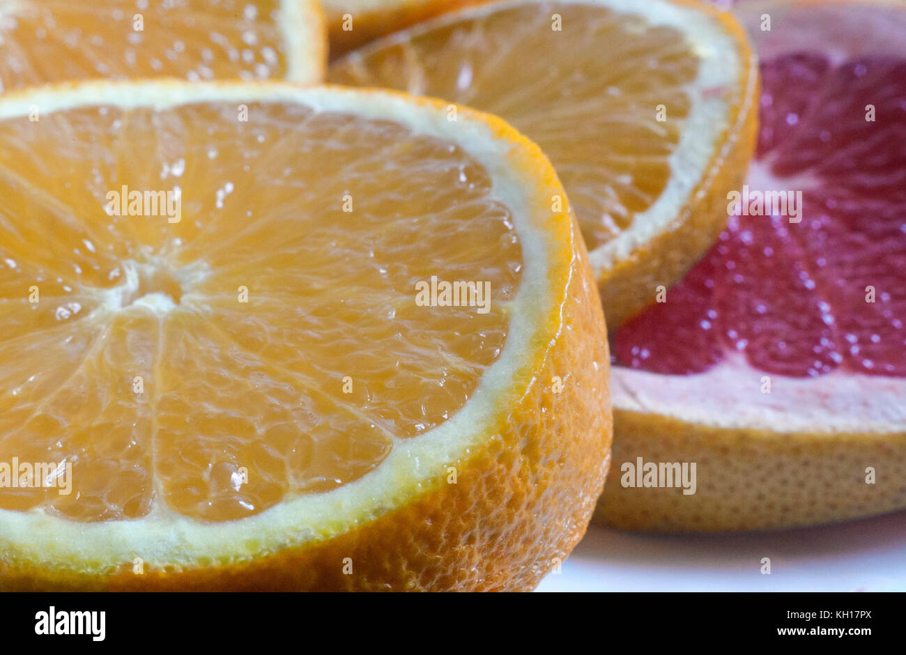 A piece of orange and grapefruit, presents closeup Stock Photo - Alamy