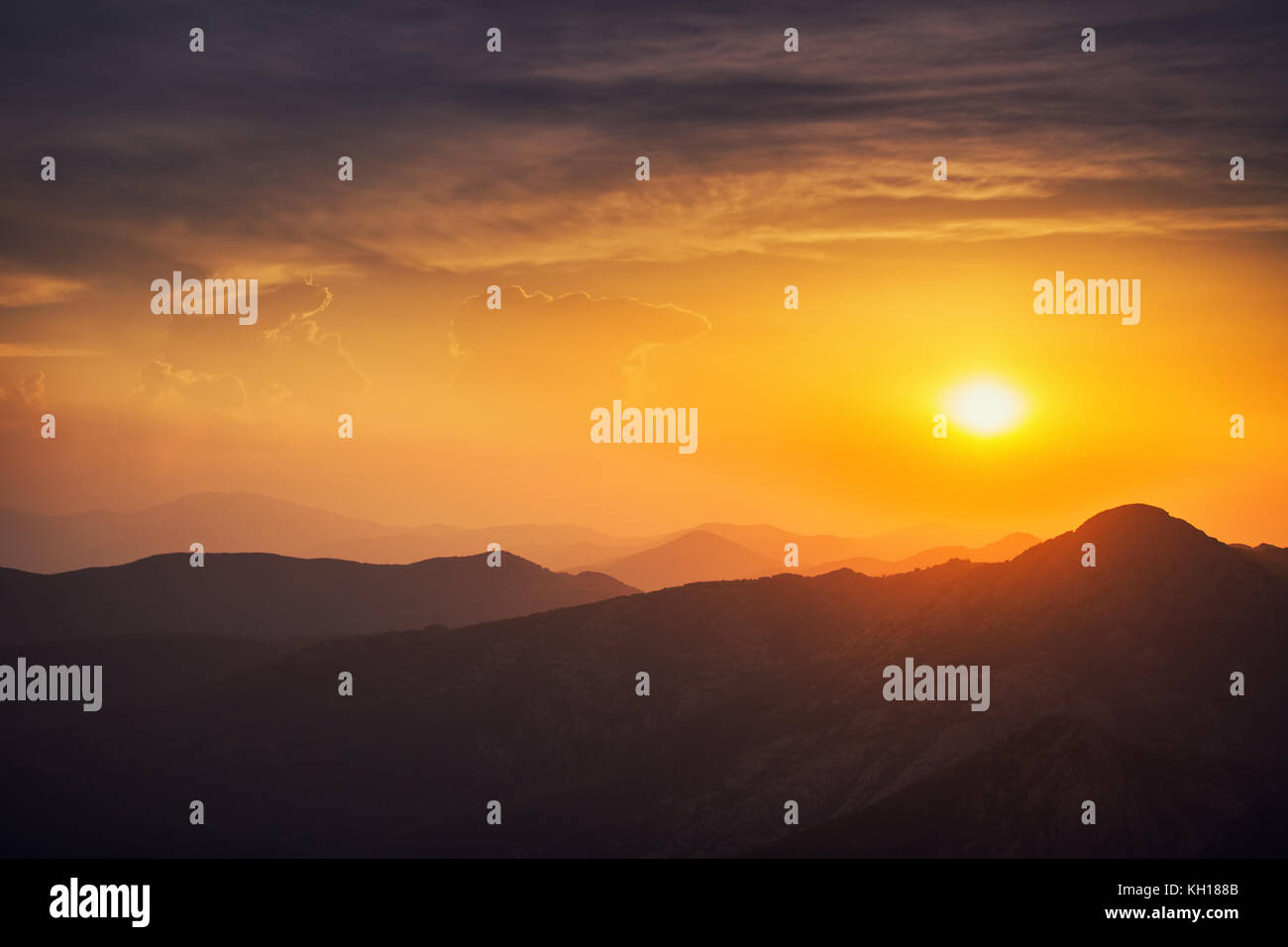 Beautiful sunset over the mountain Stock Photo - Alamy