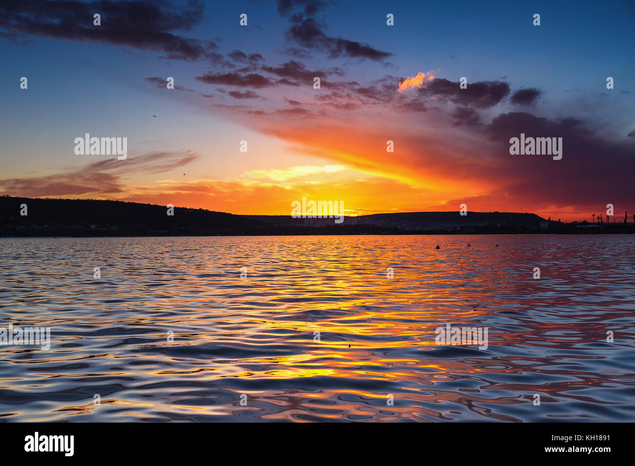 Beautiful cloudscape over the lake, sunset shot Stock Photo - Alamy