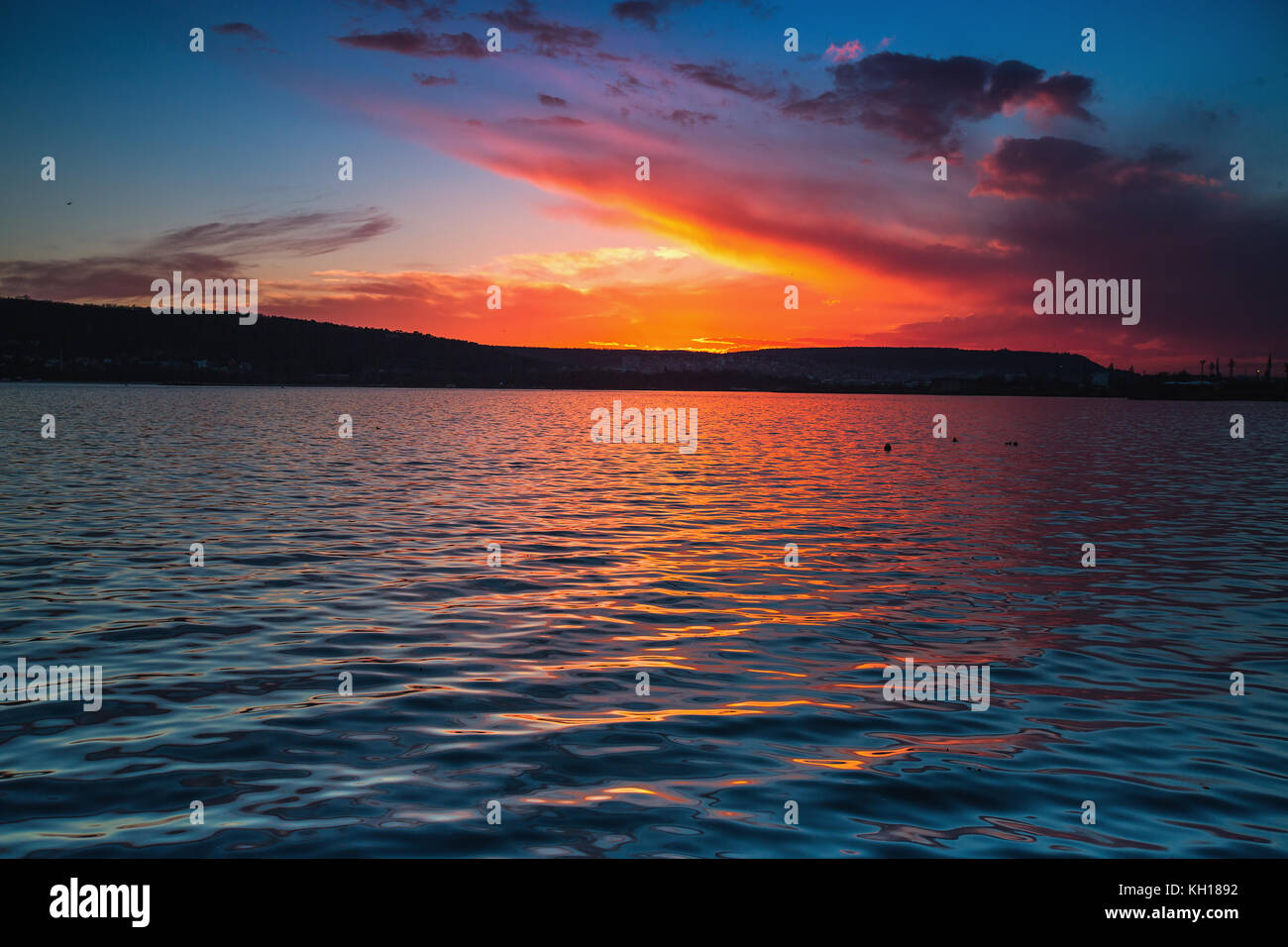 Beautiful cloudscape over the lake, sunset shot Stock Photo - Alamy