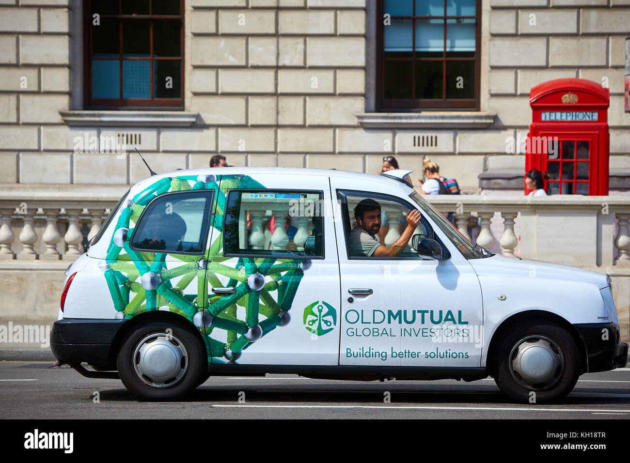 A London Hackney Carriage advertising Old Mutual Stock Photo - Alamy