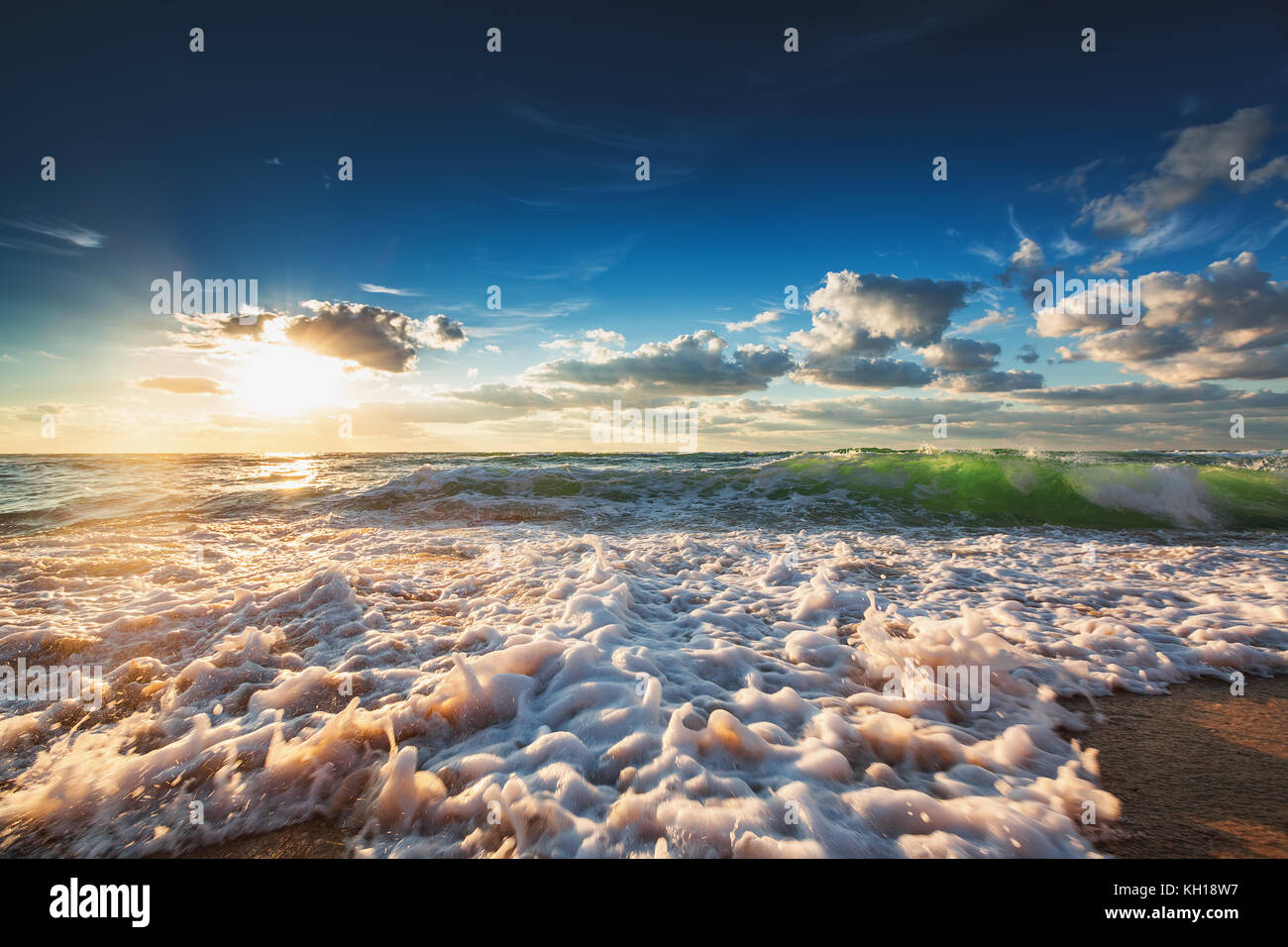 Wave sunrise hi-res stock photography and images - Alamy