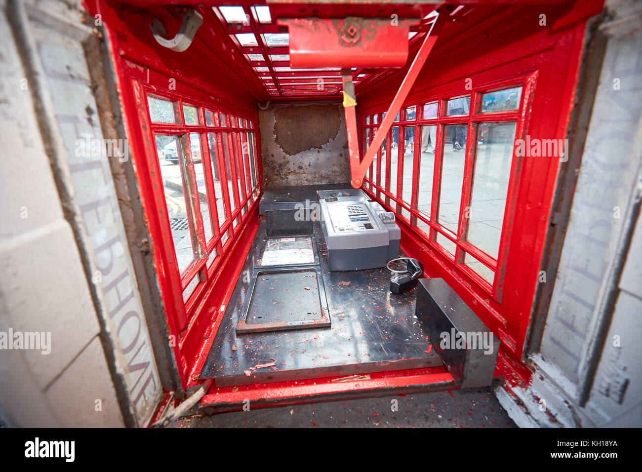 View of the inside of an old-style British red telephone box lying on ...