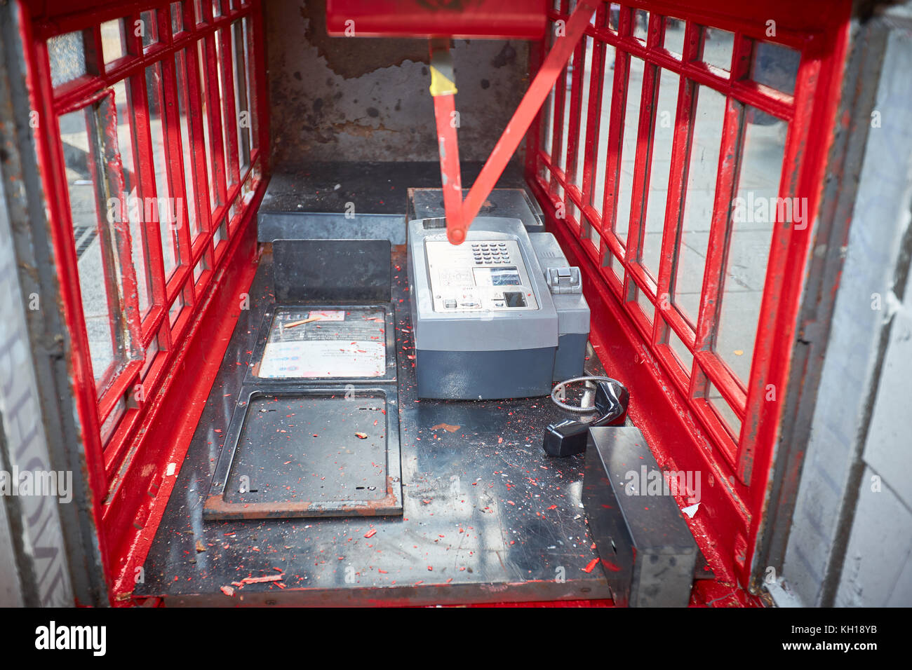 View of the inside of an old-style British red telephone box lying on ...