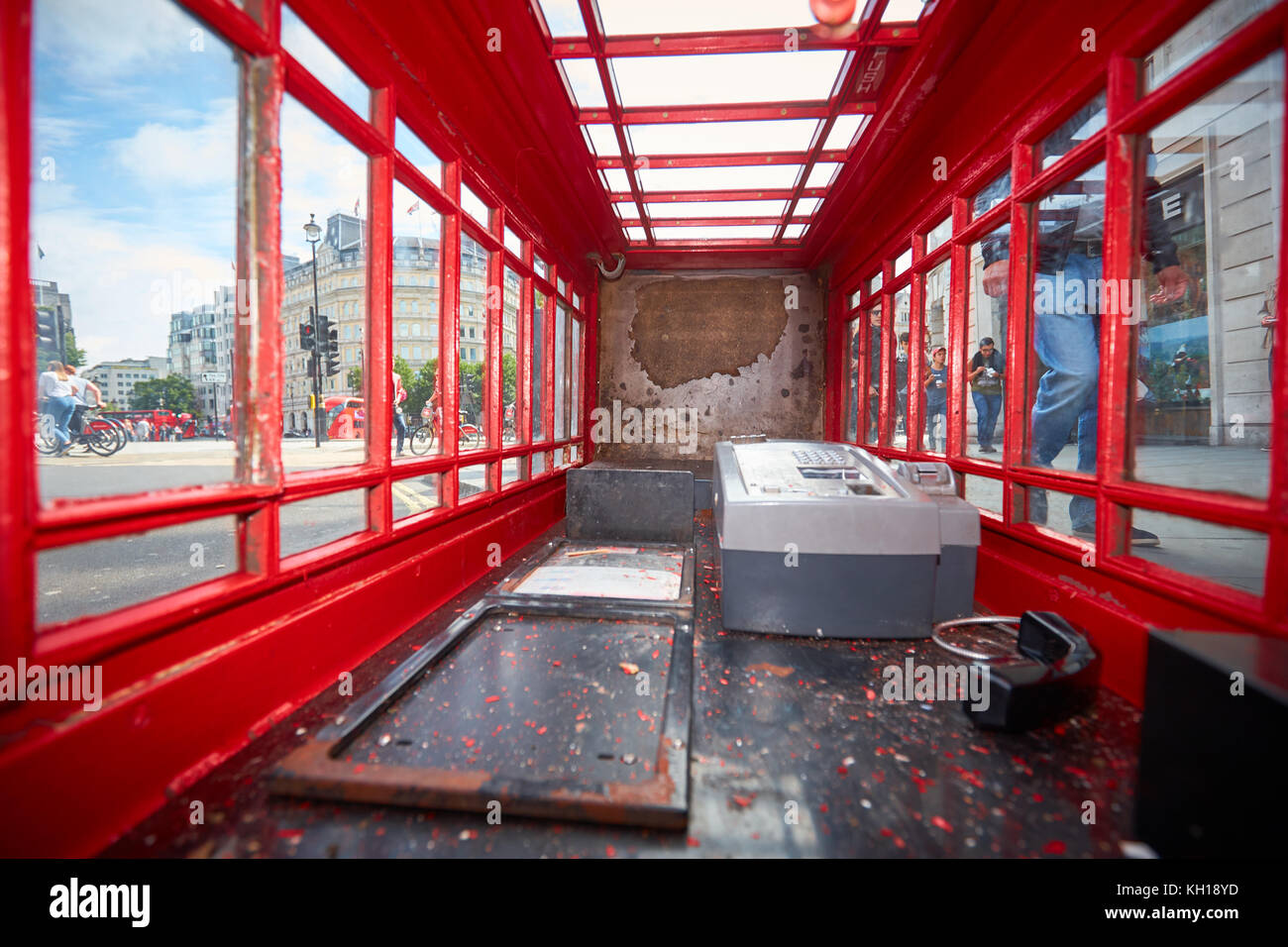 View of the inside of an old-style British red telephone box lying on ...