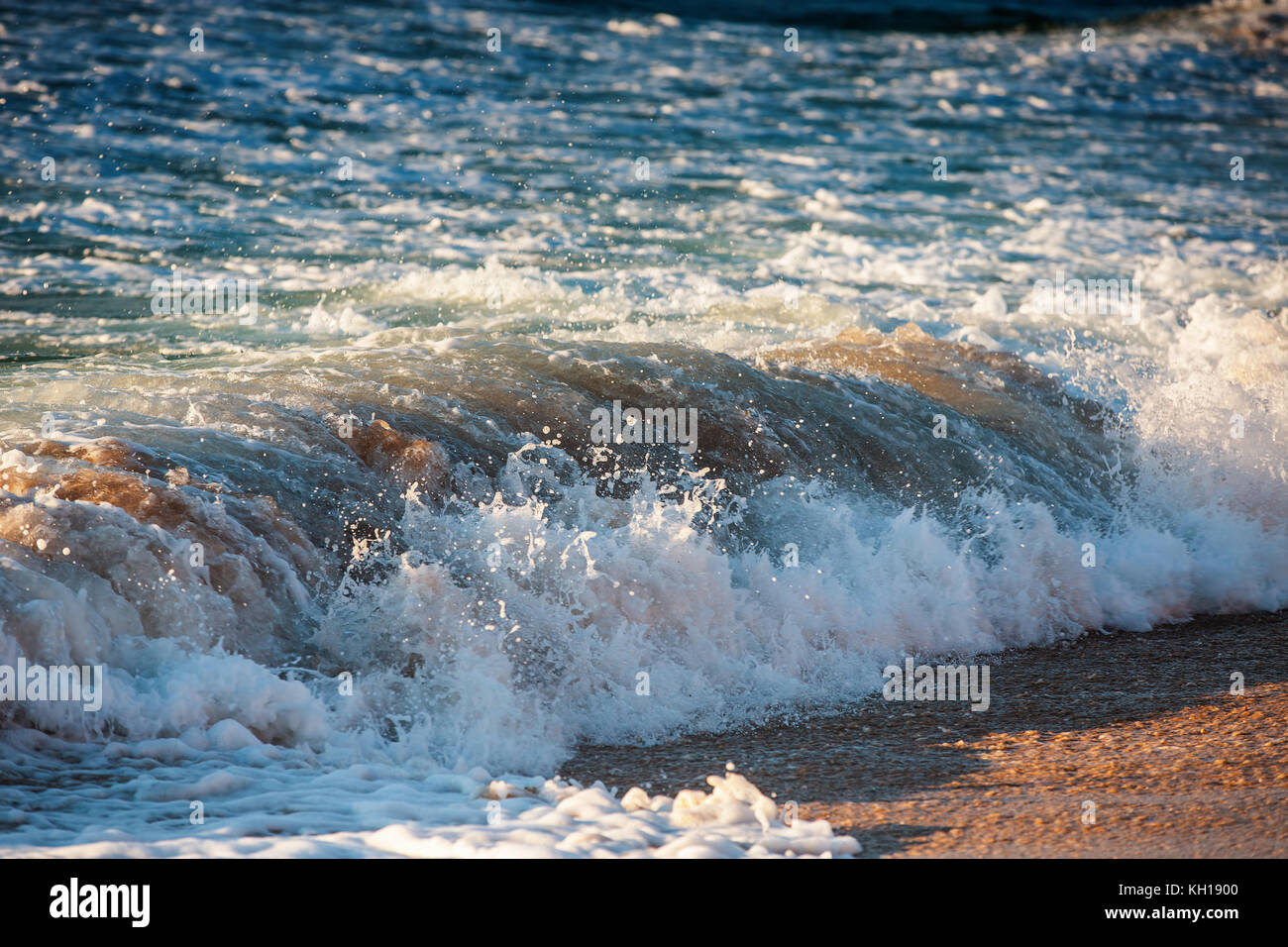 Beautiful sunrise wave Stock Photo - Alamy