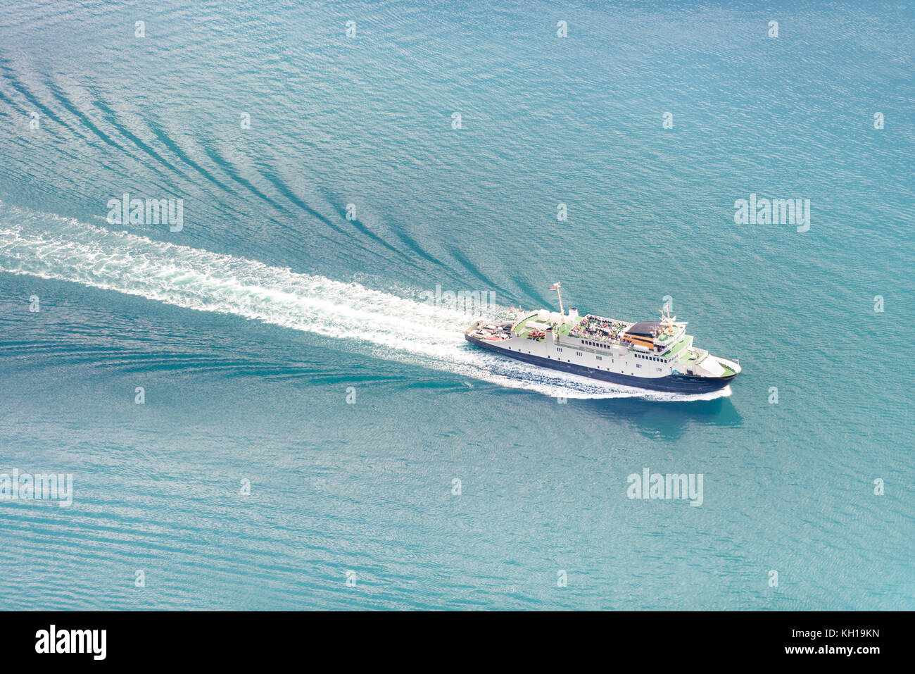 Ship in waters of fiord, Norway, Scandinavia, Europe. Blue and white ...
