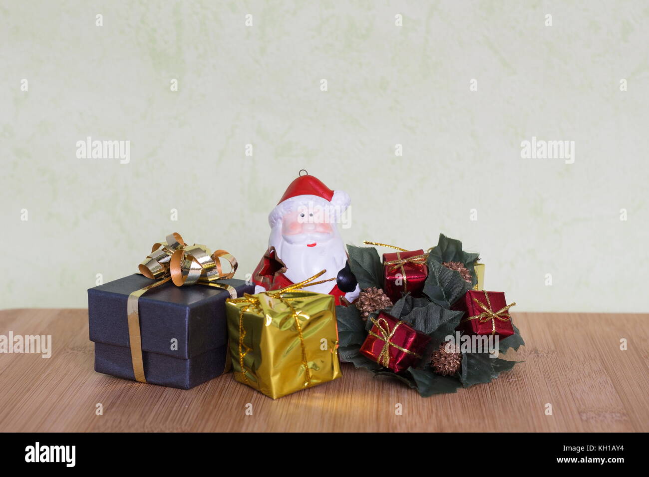 little christmas themed toy with snowman, teddy bear, ball and red ...