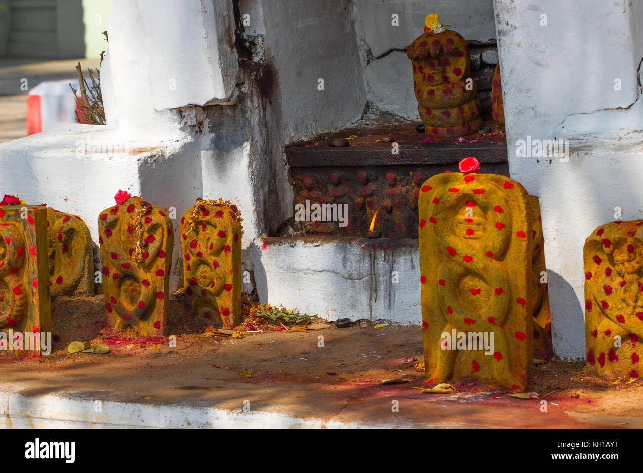Group of yellow monuments with red dots in Shiva temple, Tamil Nadu ...