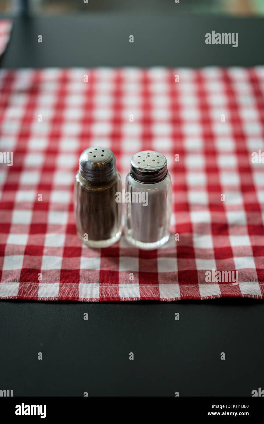 Salt and Pepper on Red and White Plaid Dish Towel Stock Photo - Alamy