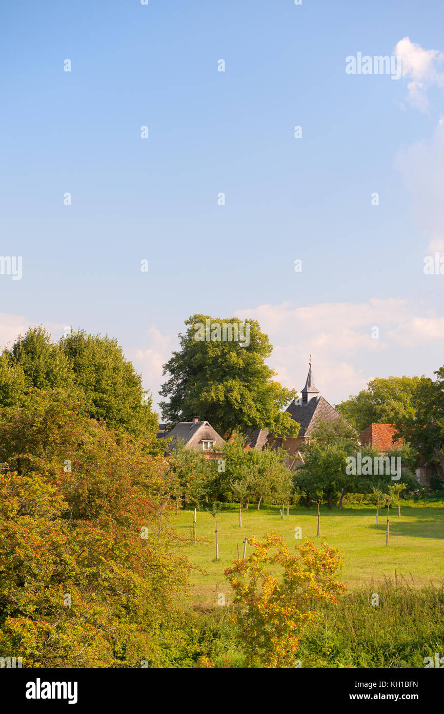 Small Dutch village in landscape Stock Photo - Alamy