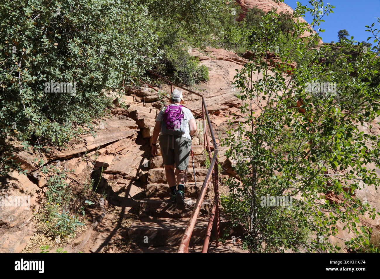 A hiker on the entry steps to the Zion National Park Canyon Overlook ...
