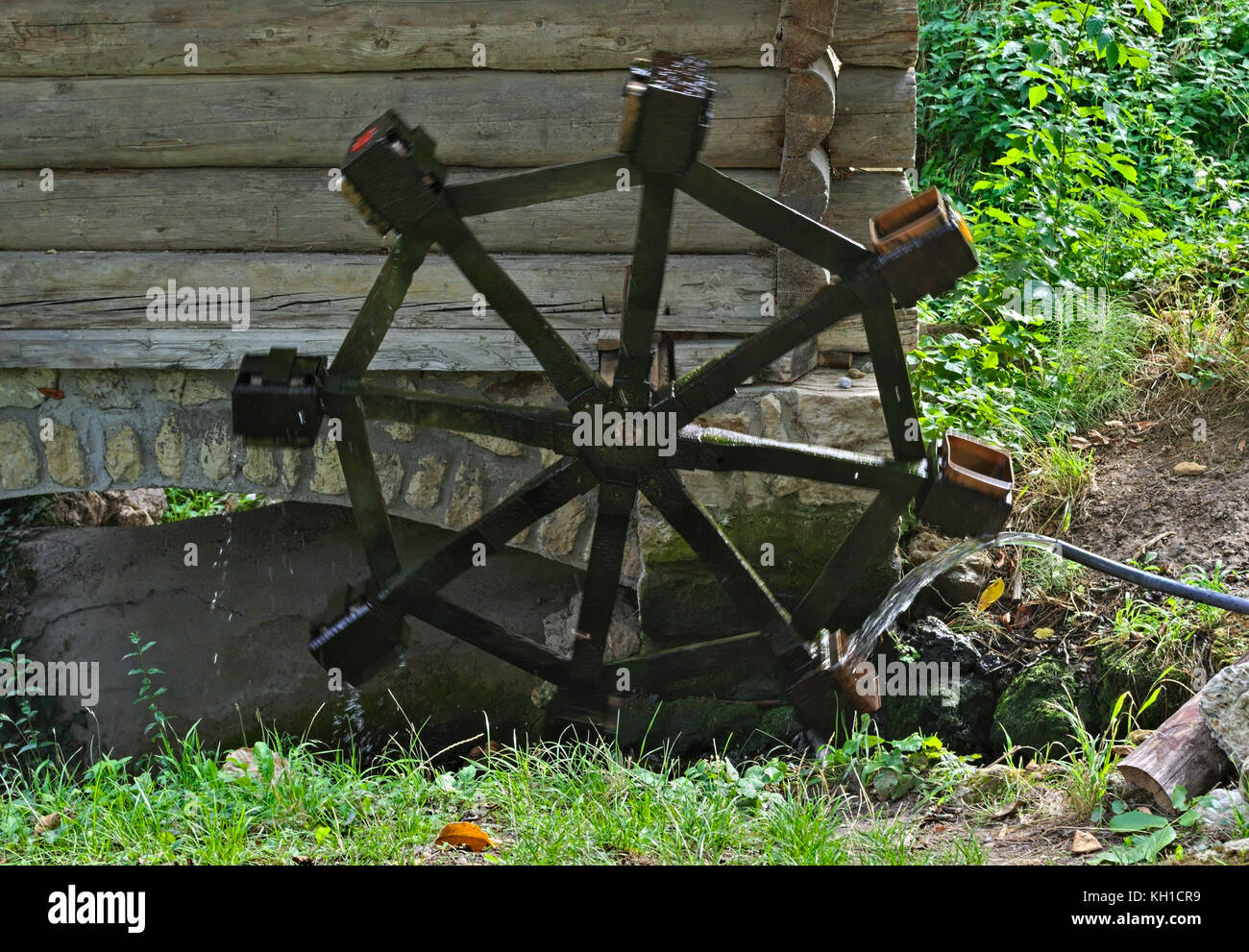 Old style wooden water mill in etno park Stock Photo - Alamy